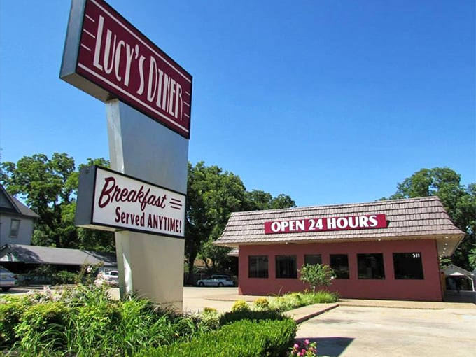 The brick-red exterior with its shingled roof and "OPEN 24 HOURS" sign isn't just a building&mdash;it's a beacon of hope for the hungry at any hour.