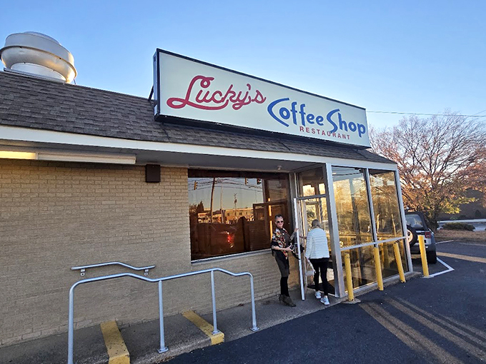 The classic brick exterior of Lucky's beckons like an old friend, witnessing more morning conversations than a therapist's office.