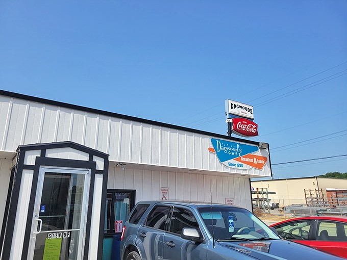 The unassuming exterior of Dagwood's Cafe stands like a time capsule against the Kansas sky, promising comfort food that transcends decades.