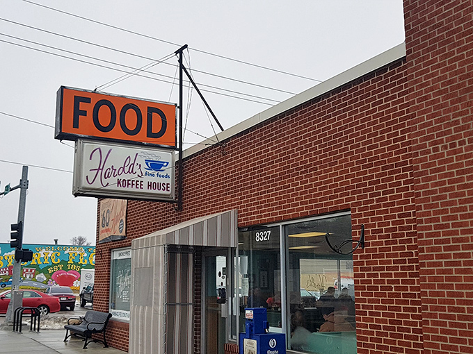 That orange "FOOD" sign might be the most honest advertising in America. No frills, just promises kept at Harold's Koffee House.