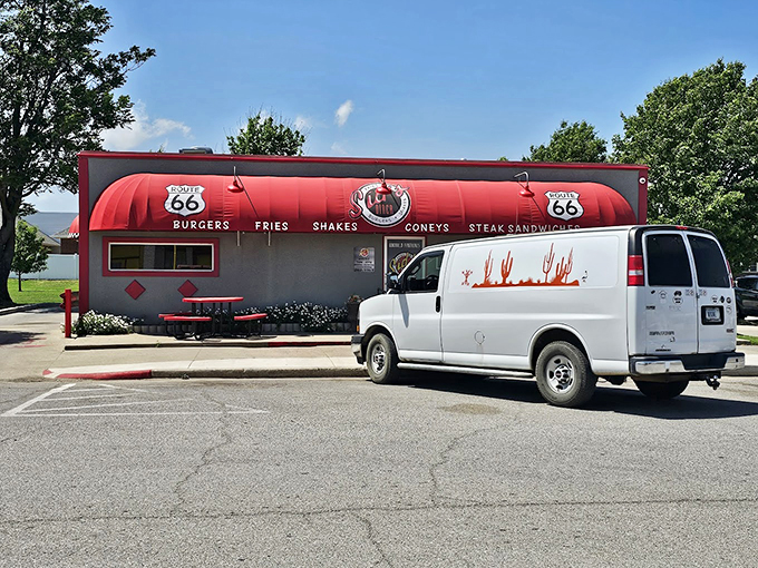 The classic Route 66 red awnings of Sid's Diner aren't just eye-catching&mdash;they're practically a beacon calling hungry travelers home to burger paradise.