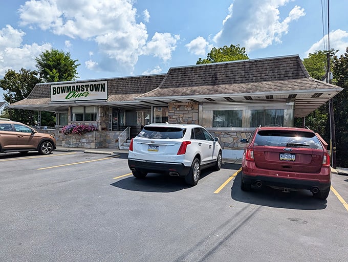 The exterior's stone facade and classic green signage stand as Pennsylvania's answer to the Bat Signal - comfort food headquarters.