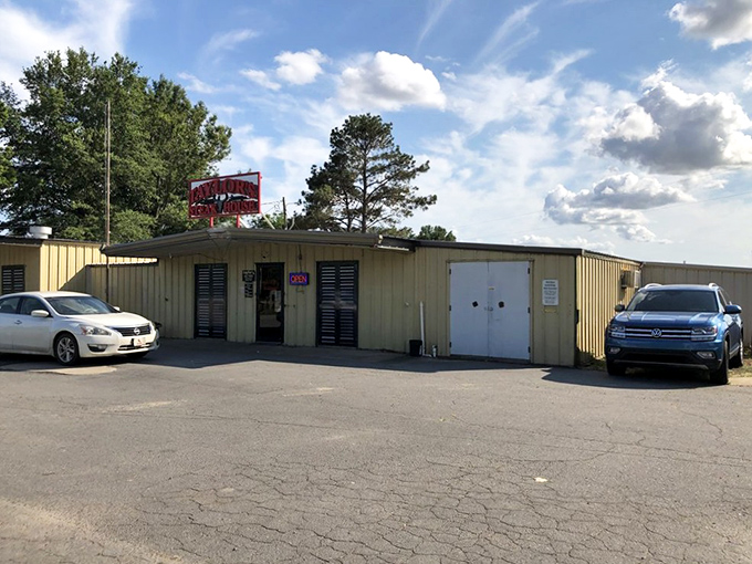 The unassuming yellow exterior of Taylor's Steakhouse stands as proof that culinary greatness often hides in plain sight.