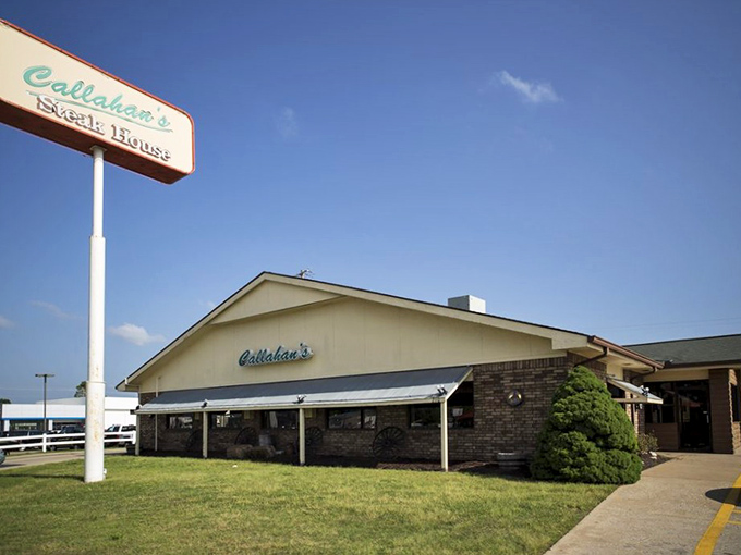 The unassuming exterior of Callahan's Steak House stands like a humble guardian of grilling secrets. No fancy frills, just the promise of carnivorous delight within.