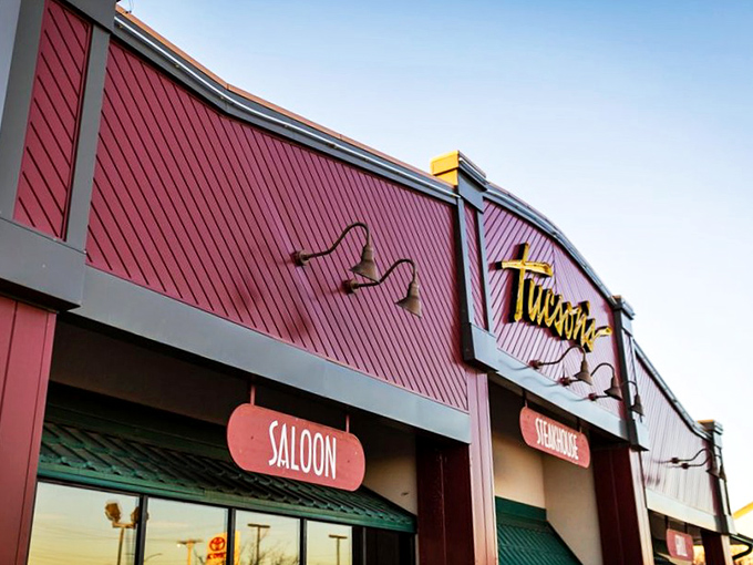 The burgundy facade of Tucson's glows with promise, like a beacon calling to hungry travelers. Those illuminated signs aren't just decoration&mdash;they're a dinner invitation you can't refuse.