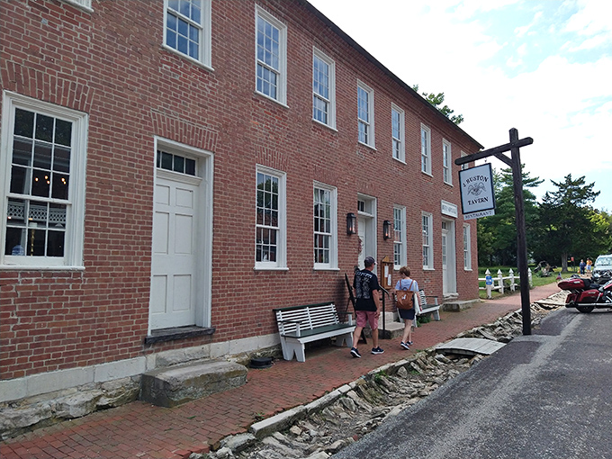 The historic red brick exterior of J. Huston Tavern stands proudly since 1834, making it the oldest continuously operating restaurant west of the Mississippi. 