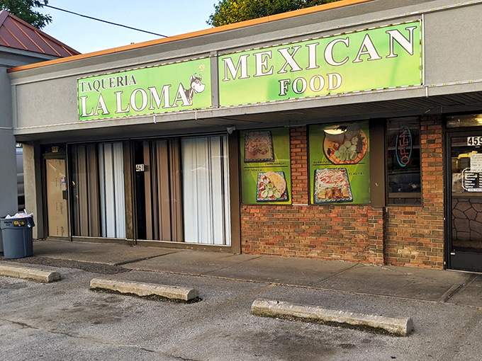 The unassuming exterior of Taqueria La Loma might not scream "culinary destination," but that green sign is basically a beacon for tamale lovers across Ohio.