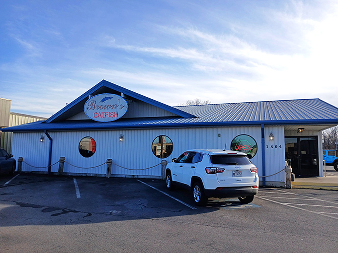 The blue-roofed temple of fried delights stands proudly against the Arkansas sky, a beacon calling hungry travelers from miles around.