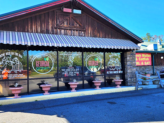 The rustic wooden exterior of Ole Times Country Buffet beckons like a siren song to hungry travelers. That "Fresh Mullet & Catfish" sign isn't just advertising&mdash;it's a promise.