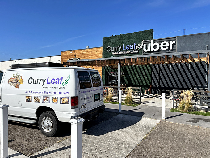 The neon sign beckons like a lighthouse for hungry souls&mdash;Curry Leaf's exterior glows with promise as dusk settles over Albuquerque.