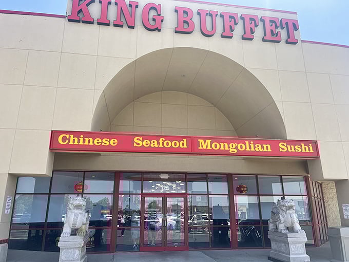 The royal welcome begins at the entrance, where stone lions stand guard like bouncers who've seen it all but still maintain their composure.