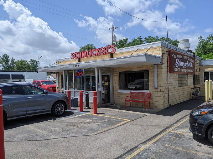 The glowing red sign of Schmucker's beckons like a lighthouse for hungry souls. Time-tested simplicity that promises exactly what it delivers.