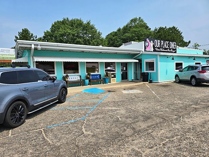 The turquoise oasis of Our Place Diner beckons hungry travelers along Highway 231 like a delicious mirage in the Alabama landscape.