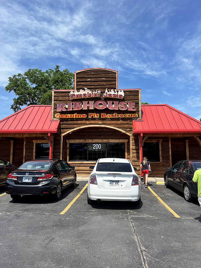 The rustic wooden facade of Smokin' Joe's Ribhouse isn't trying to impress anyone&mdash;until you taste what's cooking inside. That red roof? Consider it a beacon for barbecue pilgrims.