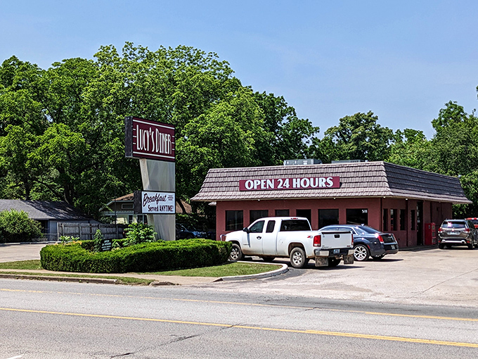 The brick-red exterior with its shingled roof and "OPEN 24 HOURS" sign isn't just a building&mdash;it's a beacon of hope for the hungry at any hour.