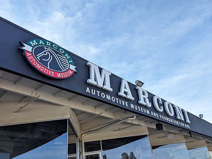 Even the parking lot is a car show at Marconi Automotive Museum, where Ferraris and Porsches casually hang out front like they're waiting for coffee.