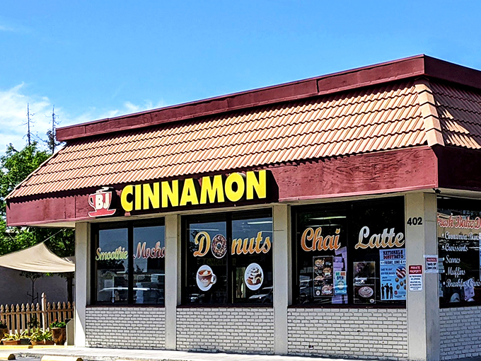 That bright yellow sign isn't just a beacon&mdash;it's a promise of pastry perfection waiting inside this unassuming Folsom strip mall gem.
