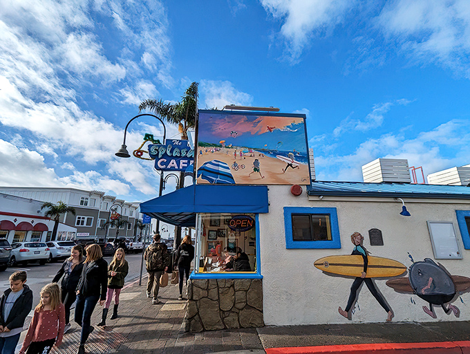 The blue-and-white facade of Splash Cafe stands like a coastal beacon, promising seafood salvation to hungry pilgrims on Pismo Beach's main drag.