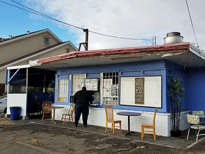 The unassuming blue exterior of Tori's Place stands like a culinary speakeasy &ndash; no fancy frills, just the promise of soul-satisfying greatness within.