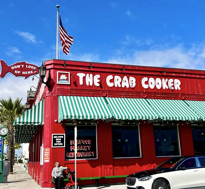 That fire-engine red exterior isn't subtle, but neither is your hunger for great seafood. The fish sign practically dares you not to look up.