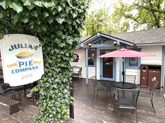 The pilgrimage begins! Julian Pie Company's charming exterior with its signature red umbrellas promises sweet salvation after the winding mountain drive.