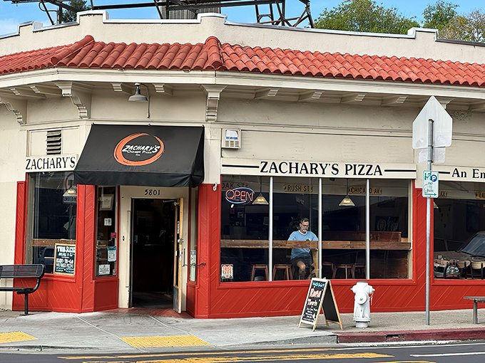 The corner storefront that launched a thousand cravings. Zachary's iconic Rockridge location glows like a beacon for pizza pilgrims after dark.