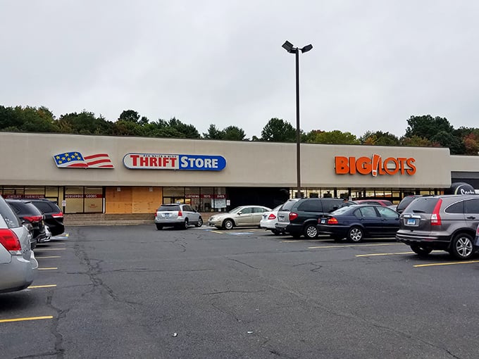 The patriotic facade of Red White & Blue Thrift Store stands proudly against a blue Connecticut sky, like a bargain-hunter's version of the Promised Land.