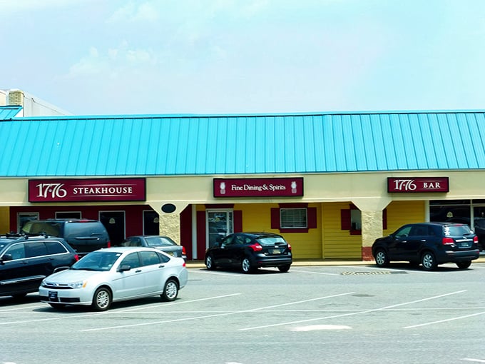 The iconic red fa&ccedil;ade and teal roof of 1776 Steakhouse stands as a beacon for carnivores seeking revolution-worthy meals in Rehoboth Beach.