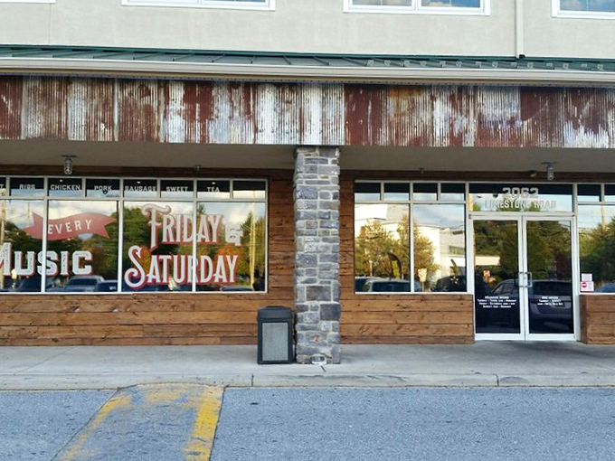 The rustic wooden fa&ccedil;ade of Limestone BBQ and Bourbon promises what every barbecue pilgrim seeks: a temple where smoke, meat, and time create magic.