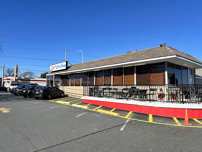 The classic brick exterior of Lucky's beckons like an old friend. That outdoor seating area has witnessed more morning conversations than a therapist's office.