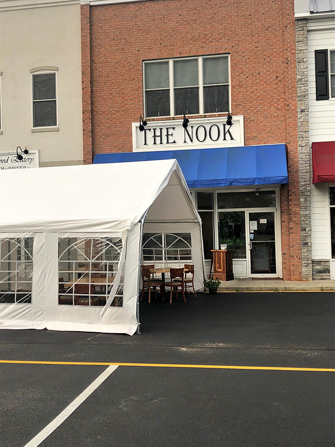 The brick fa&ccedil;ade and bright blue awning of The Nook stands as Milton's humble breakfast fortress, where culinary magic happens without fanfare or fuss.