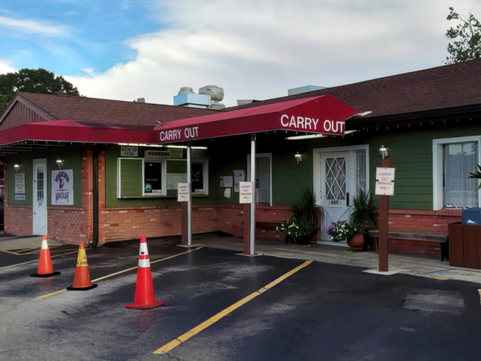 The unassuming exterior of Yoder's belies the culinary treasures within, like a delicious secret hiding in plain sight on Sarasota's Bahia Vista Street.