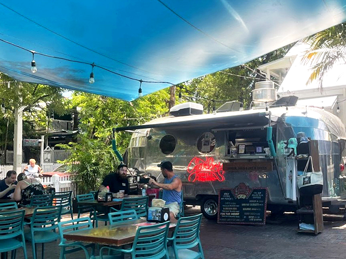 Paradise found! Garbo's turquoise cottage and shaded patio create the perfect Key West vibe for serious food enthusiasts seeking refuge from ordinary meals.
