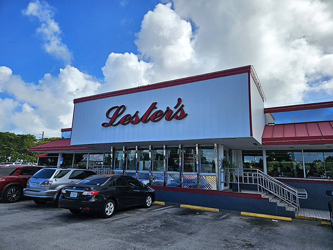 Lester's iconic red and white exterior stands like a beacon of breakfast hope on State Road 84, promising comfort food salvation since 1967.