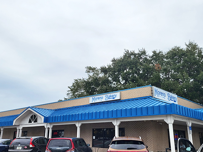 The unassuming blue awning of Moreno Bakery hides culinary treasures that would make a food detective's heart race. Florida's best-kept secret sits quietly in plain sight.