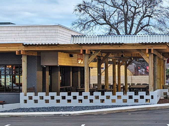 The unassuming gray exterior of Six Feet Under belies the seafood paradise waiting inside. That fish logo promises delicious things to come.