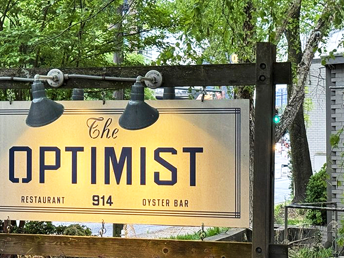 The outdoor oasis at The Optimist proves that sometimes the best appetizer is fresh air and a mini-golf challenge before diving into seafood heaven.
