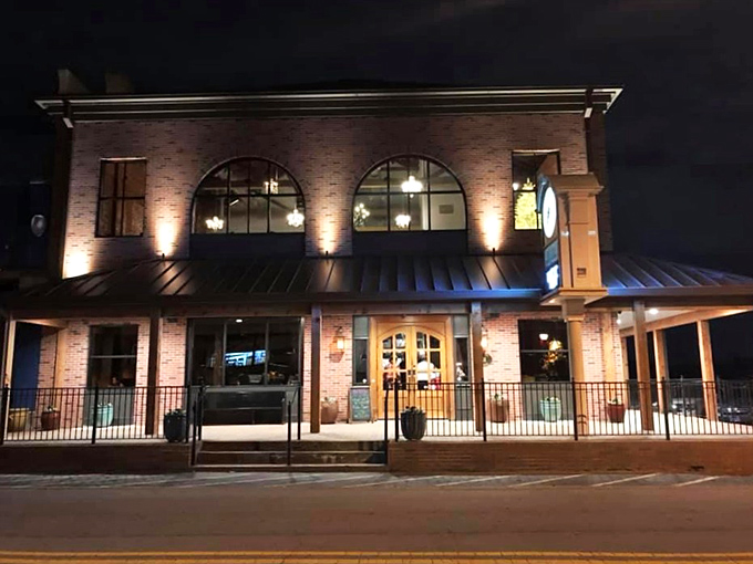Brick and character define Bare Bones' exterior in downtown Buford, where culinary magic happens behind those unassuming walls.