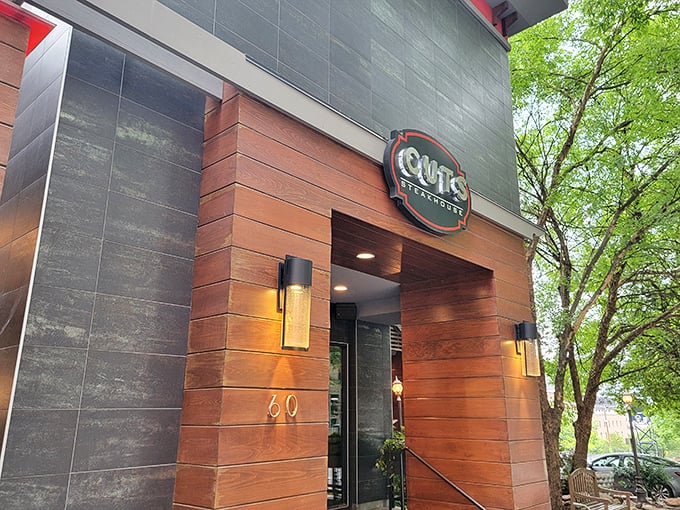 The unassuming exterior of Cuts Steakhouse belies the culinary magic happening inside. Like finding a diamond in downtown Atlanta's concrete jungle.