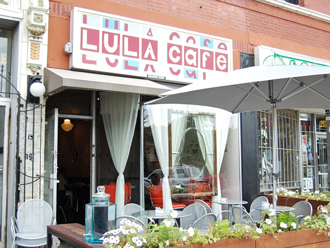 Logan Square's architectural gem houses culinary magic. That ornate entrance and colorful sign promise something special before you even taste a bite.