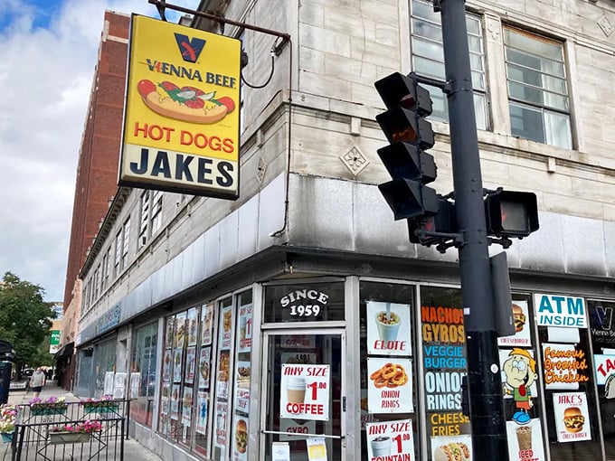 That iconic yellow Vienna Beef sign beckons like a lighthouse for the hungry, promising Chicago's most sacred culinary tradition lies within.