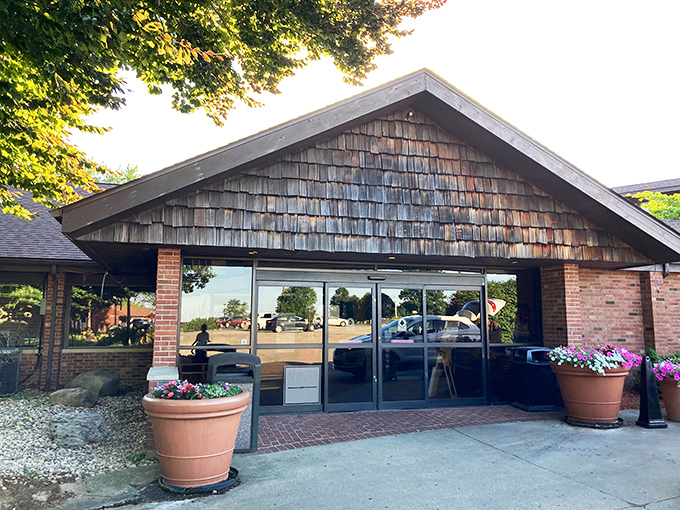 The unassuming cedar-shingled entrance to The Beef House belies the carnivorous paradise waiting inside. Like finding a treasure chest disguised as a garden shed.