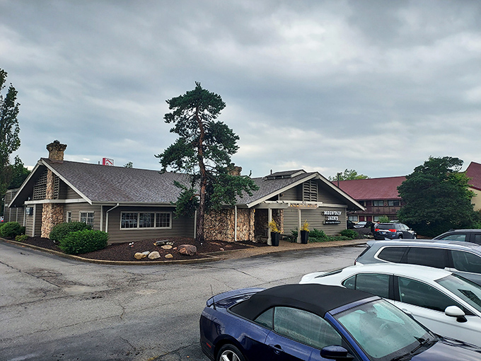 The unassuming exterior of Mountain Jacks hides a carnivore's paradise within. Like finding a treasure chest disguised as a garden shed.