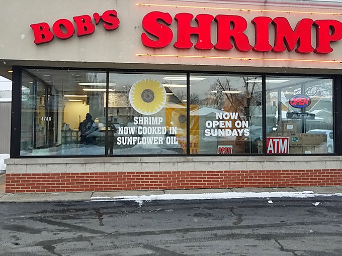The glowing red sign of Bob's Shrimp stands out like a beacon for seafood lovers, promising simple pleasures in an unassuming package.
