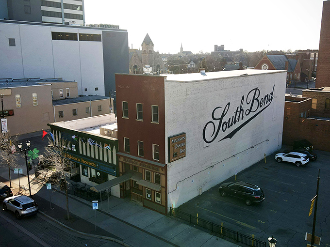 The Madison Oyster Bar stands proudly against South Bend's skyline, a brick beacon of seafood salvation in the heart of Notre Dame country.