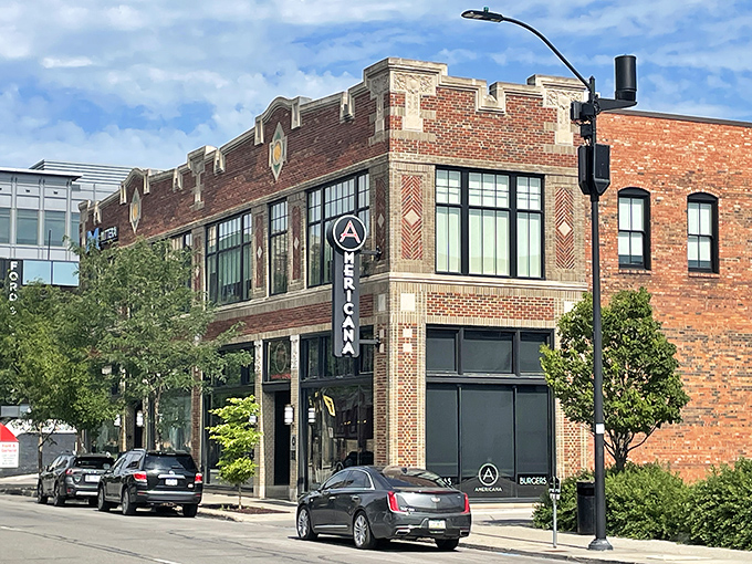 Americana's historic brick exterior stands proudly on a Des Moines corner, promising culinary adventures within. The architectural character alone is worth the visit.