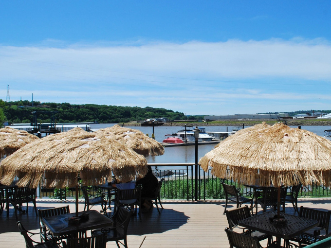 Catfish Charlie's welcomes you with casual charm, its blue spruce standing guard like a Midwest sentinel protecting seafood treasures within. 