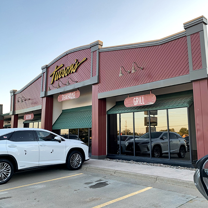 The burgundy facade of Tucson's glows with promise, like a beacon calling to hungry travelers. Those illuminated signs aren't just decoration&mdash;they're a dinner invitation you can't refuse.