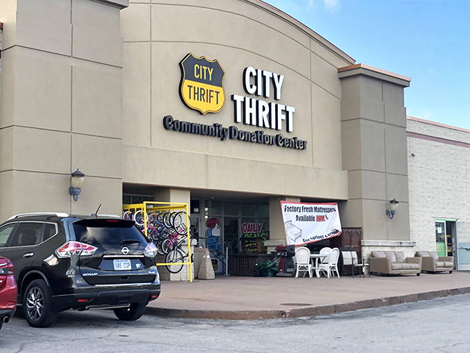 The grand facade of City Thrift stands like a cathedral of secondhand treasures, beckoning bargain hunters with its promise of affordable adventures.