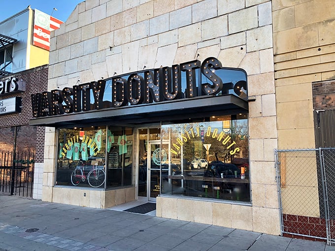 The marquee-style sign at Varsity Donuts lights up Aggieville like a Broadway show where the starring role goes to fried dough and happiness.